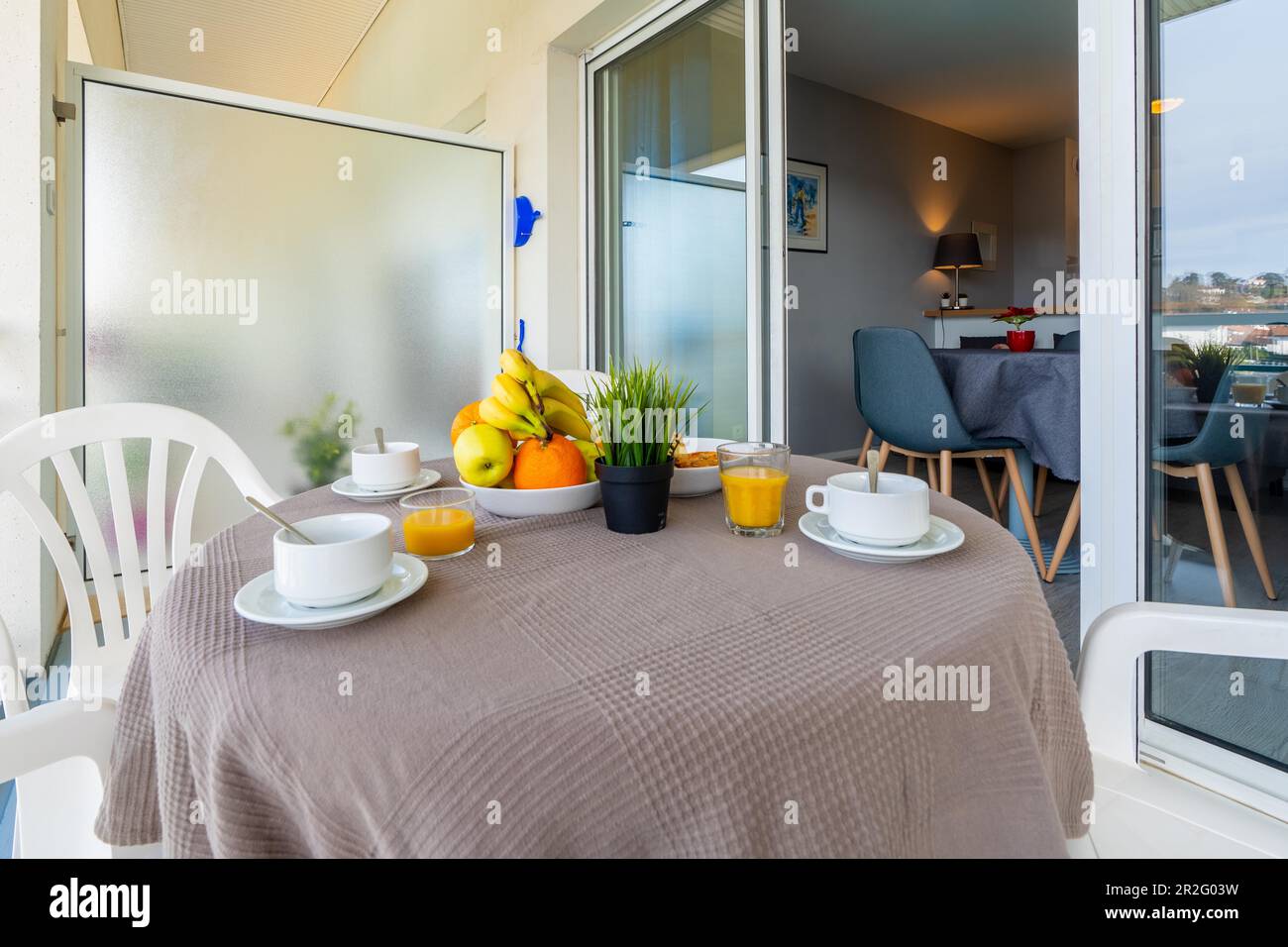 Breakfast on a terrace one summer morning, healthy breakfast with ...