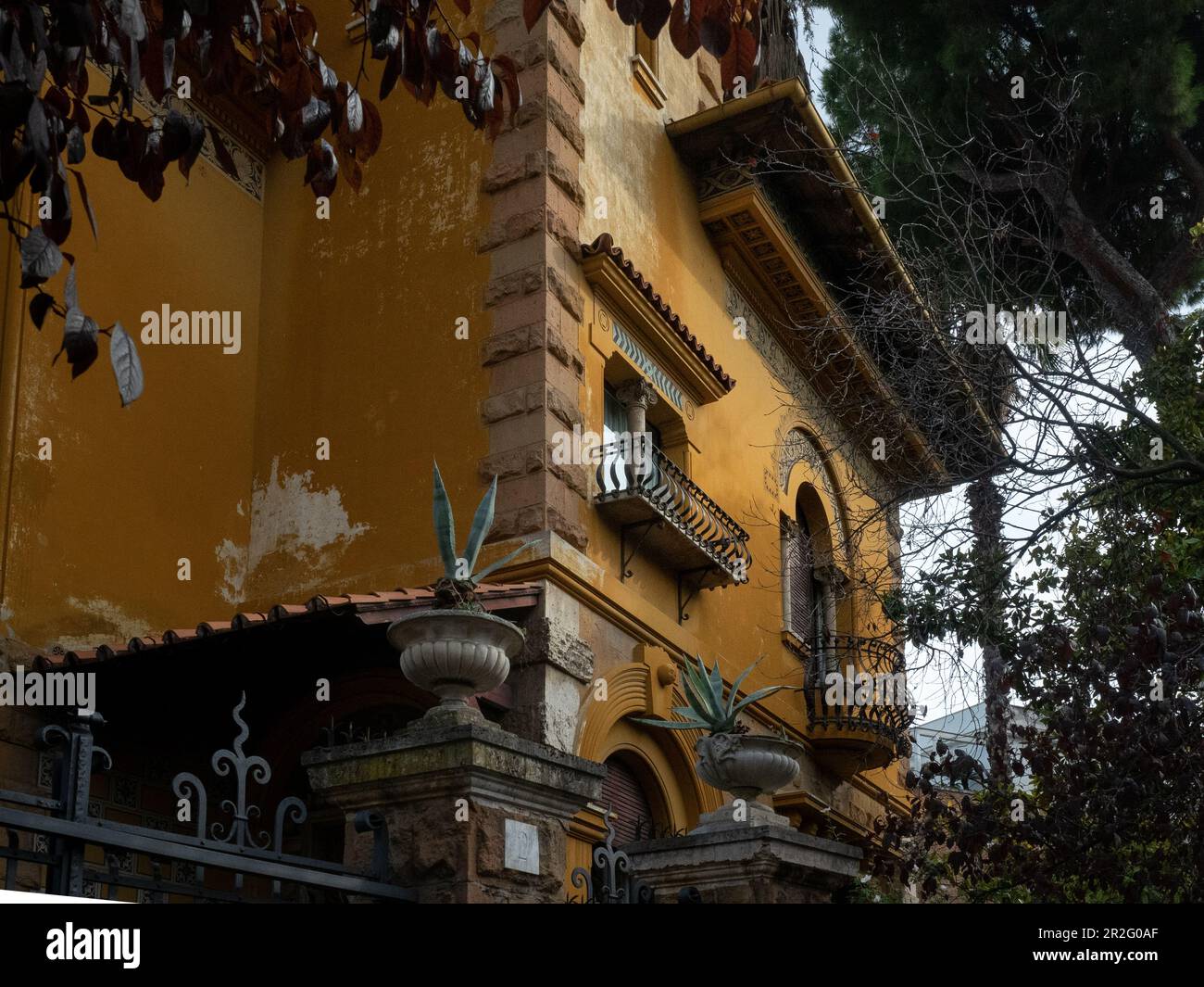 Quartiere Coppeda, Rome, Italy: detail of a yellow building with two ...