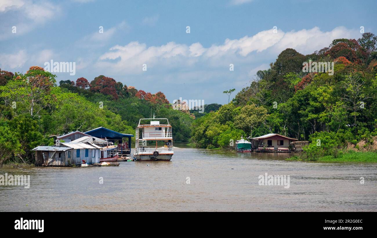Amazon steamers and houses on the Amazon, rainforest, Amazon basin ...
