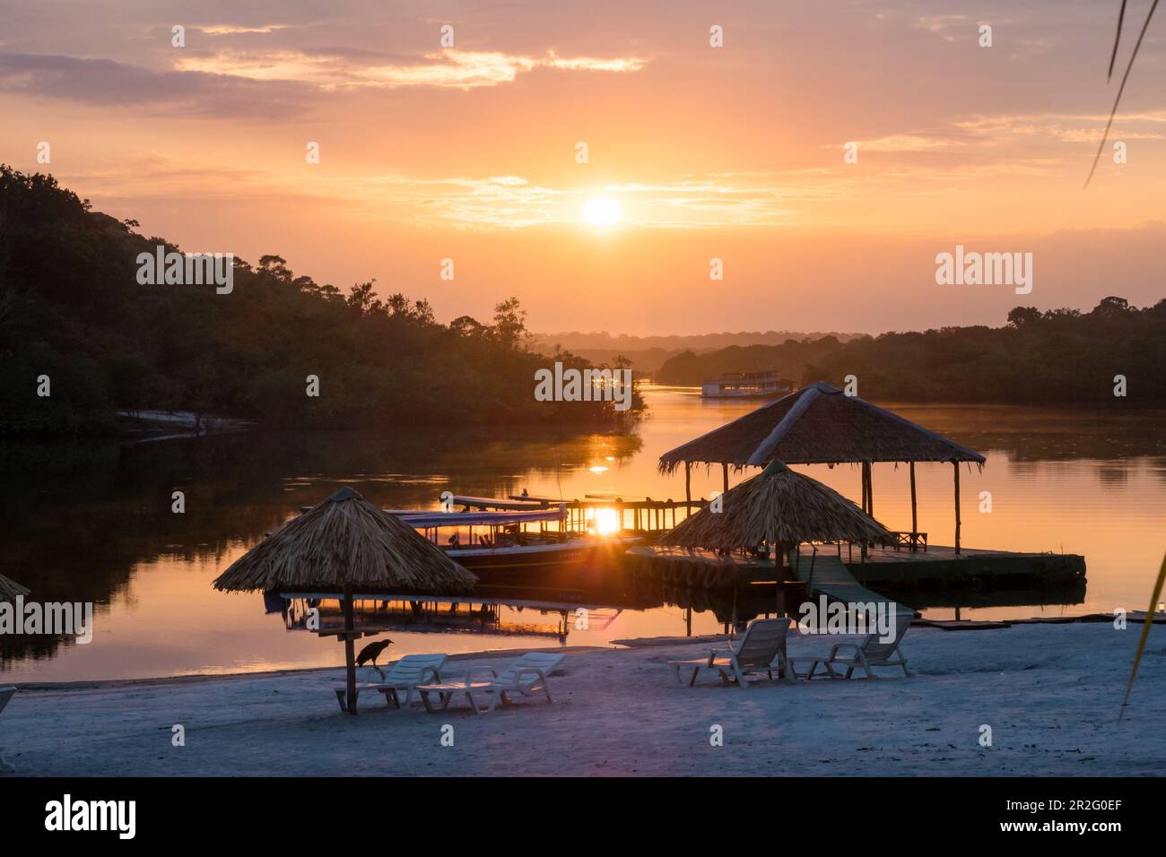 Tourists resort on the Amazon near Manaus, sunrise, Amazon basin ...