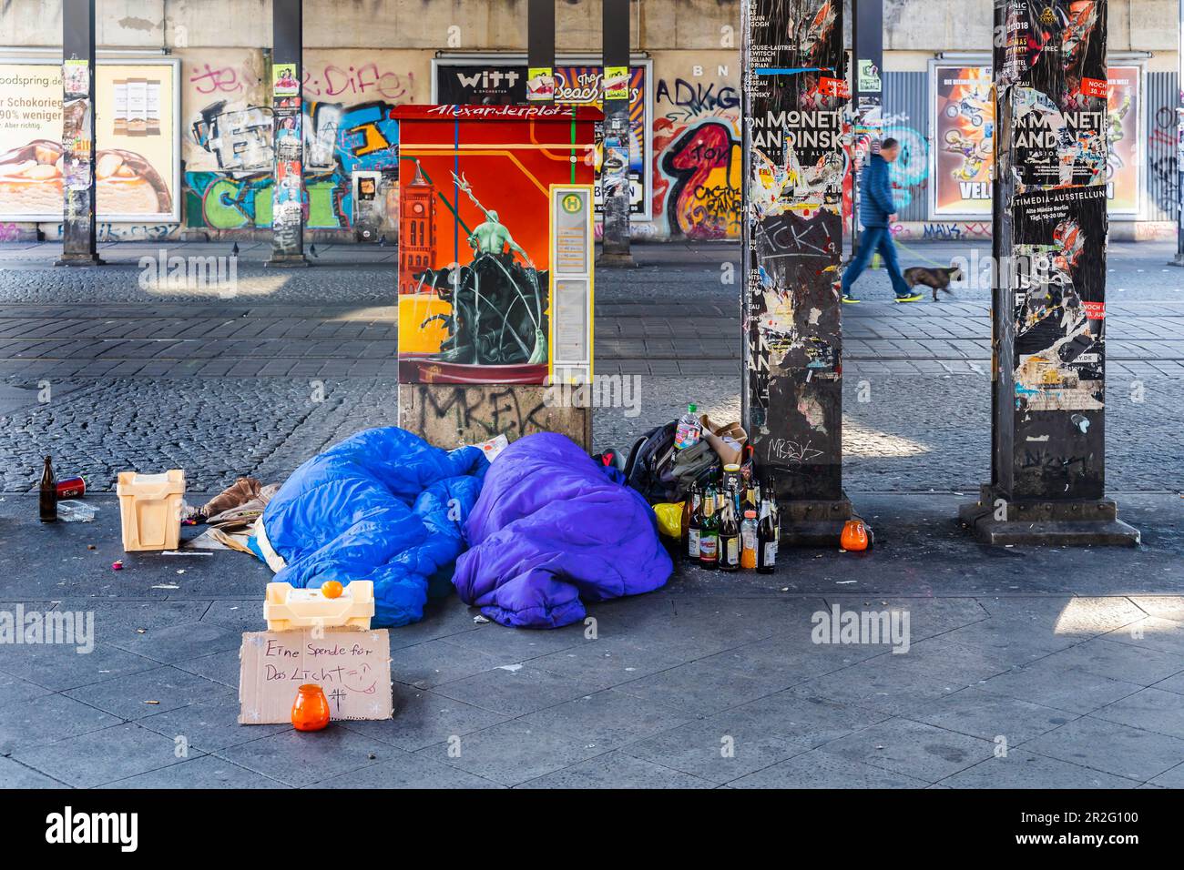 A donation for light, homeless man sleeping under a bridge in close ... A donation for light, homeless man sleeping under a bridge in close ...