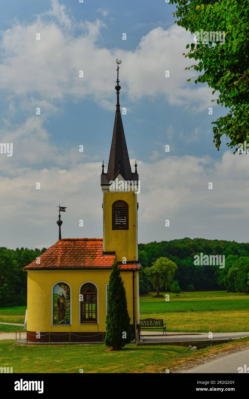 Lonely church with a bench near Radoslavci, Slovenia Stock Photo - Alamy