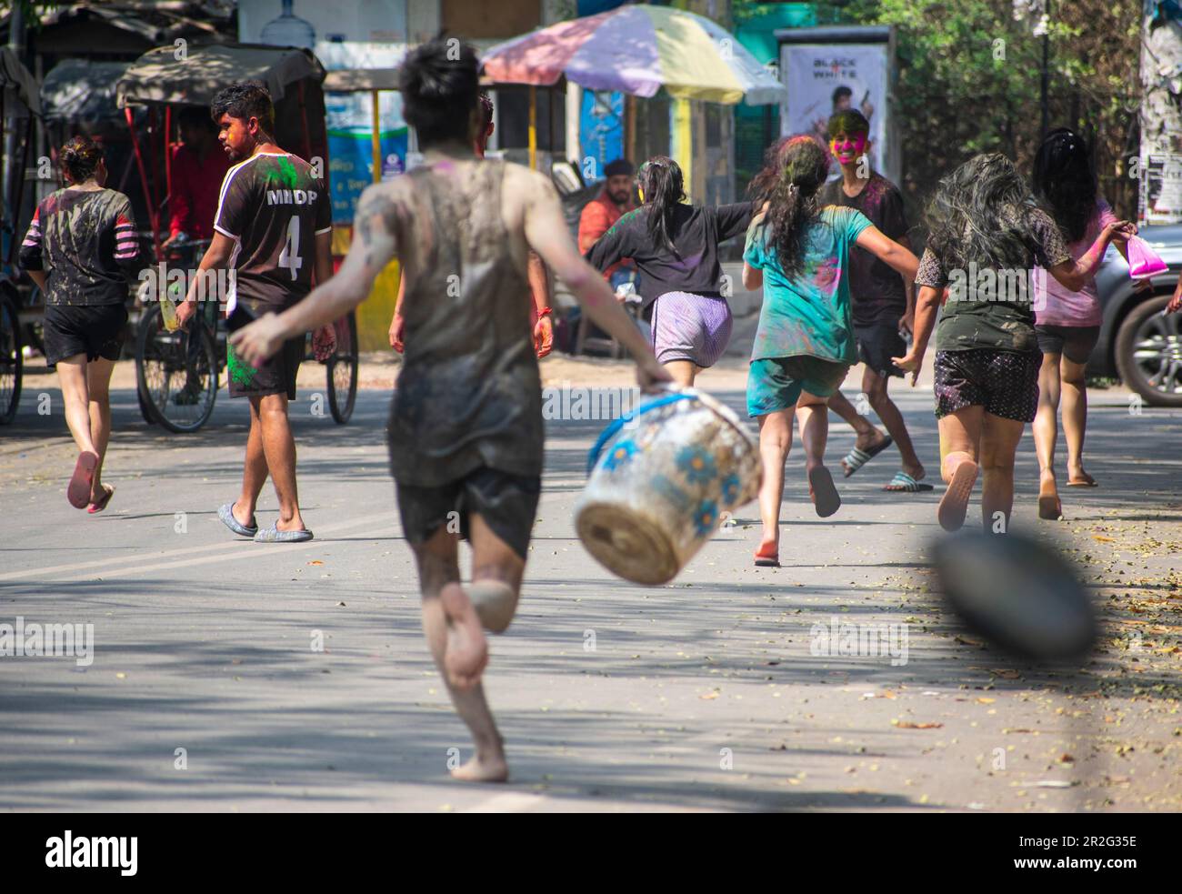Revellers palying mud to celebrate Holi, the Hindu spring festival of ...