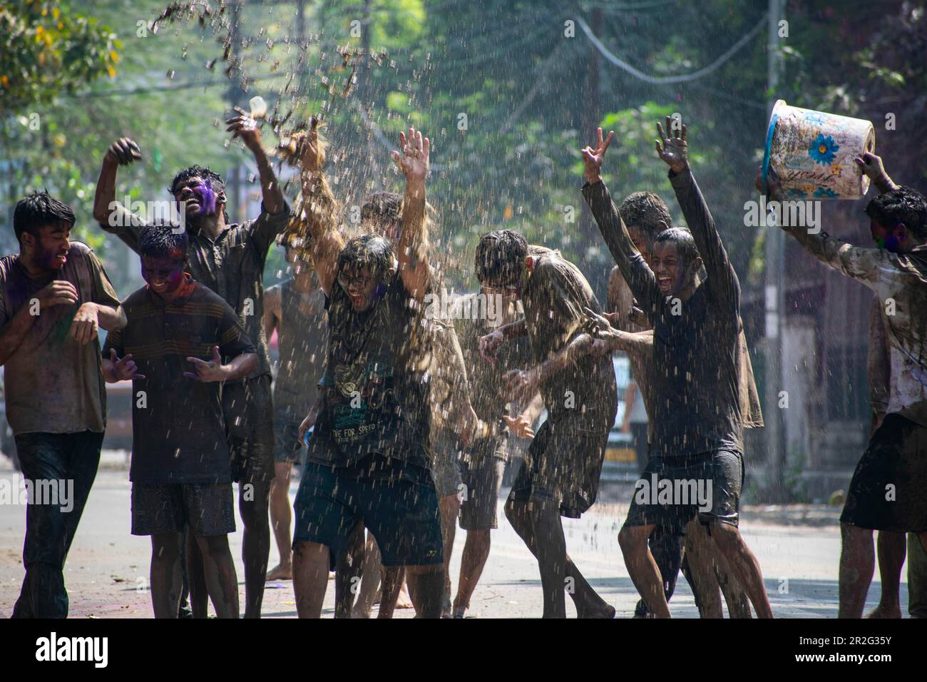 Revellers palying mud to celebrate Holi, the Hindu spring festival of ...