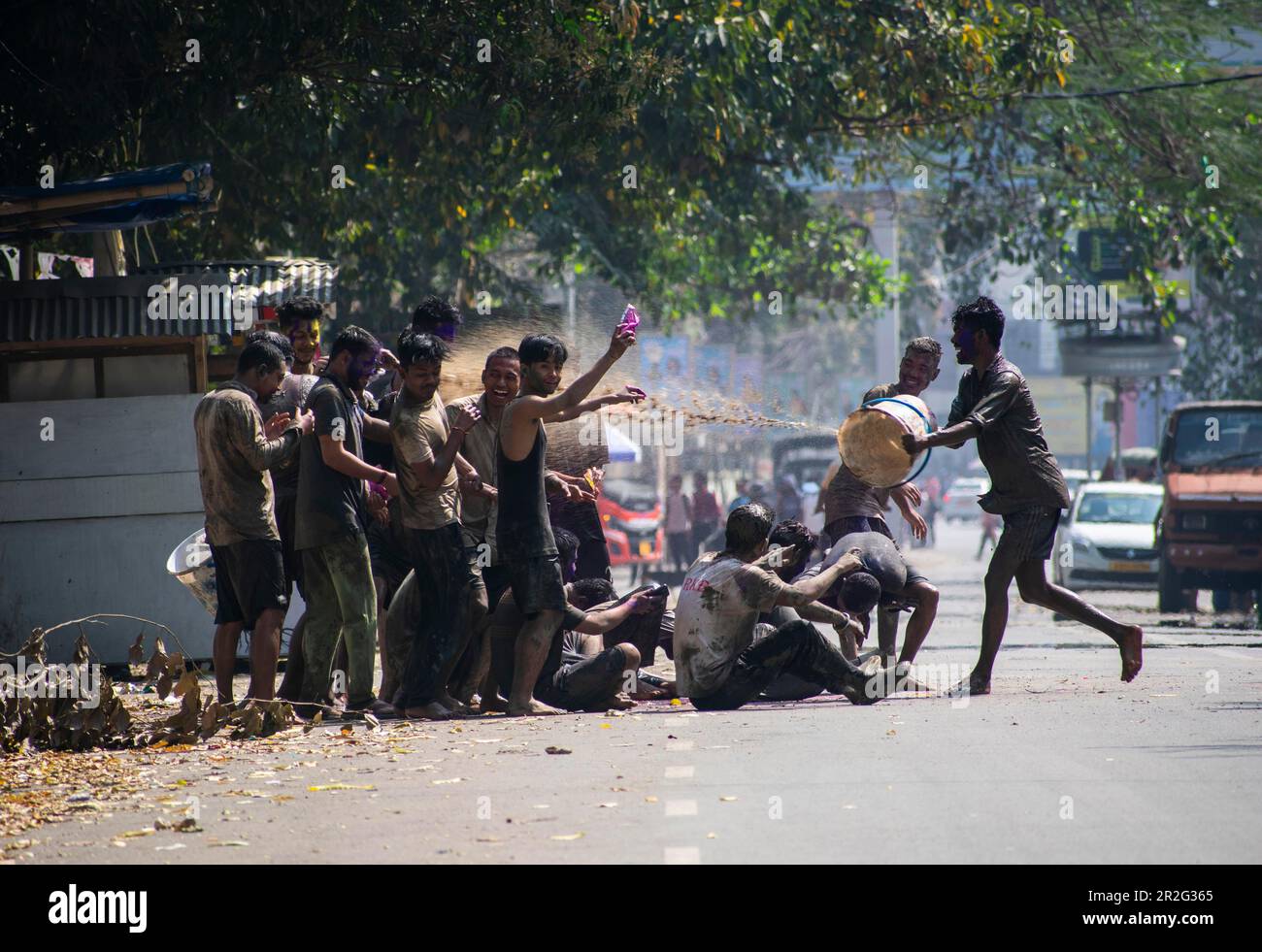 Revellers palying mud to celebrate Holi, the Hindu spring festival of ...