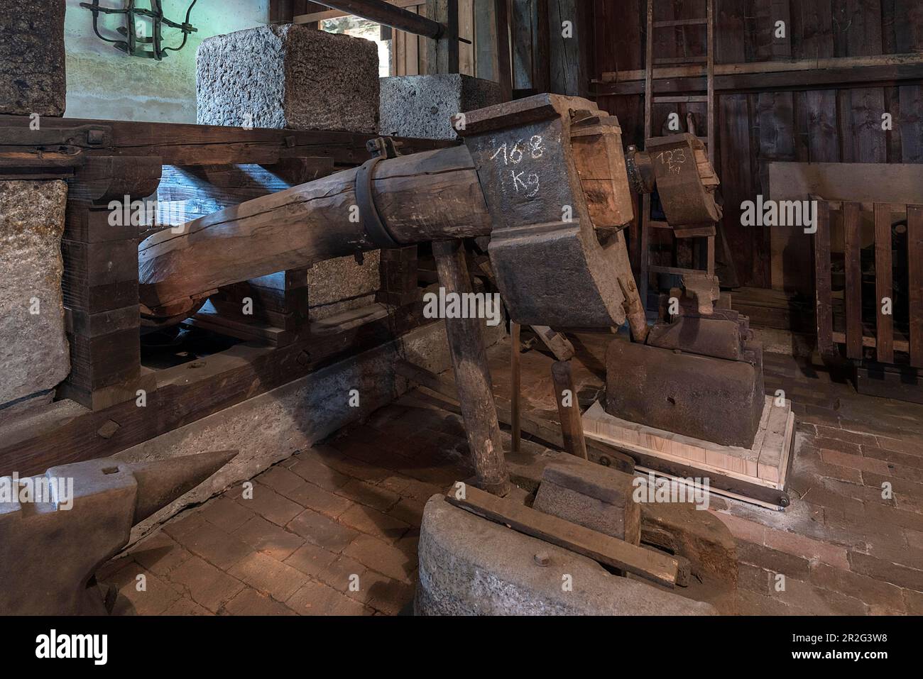 Historic tail hammers, used since 1900, in a historic hammer mill ...