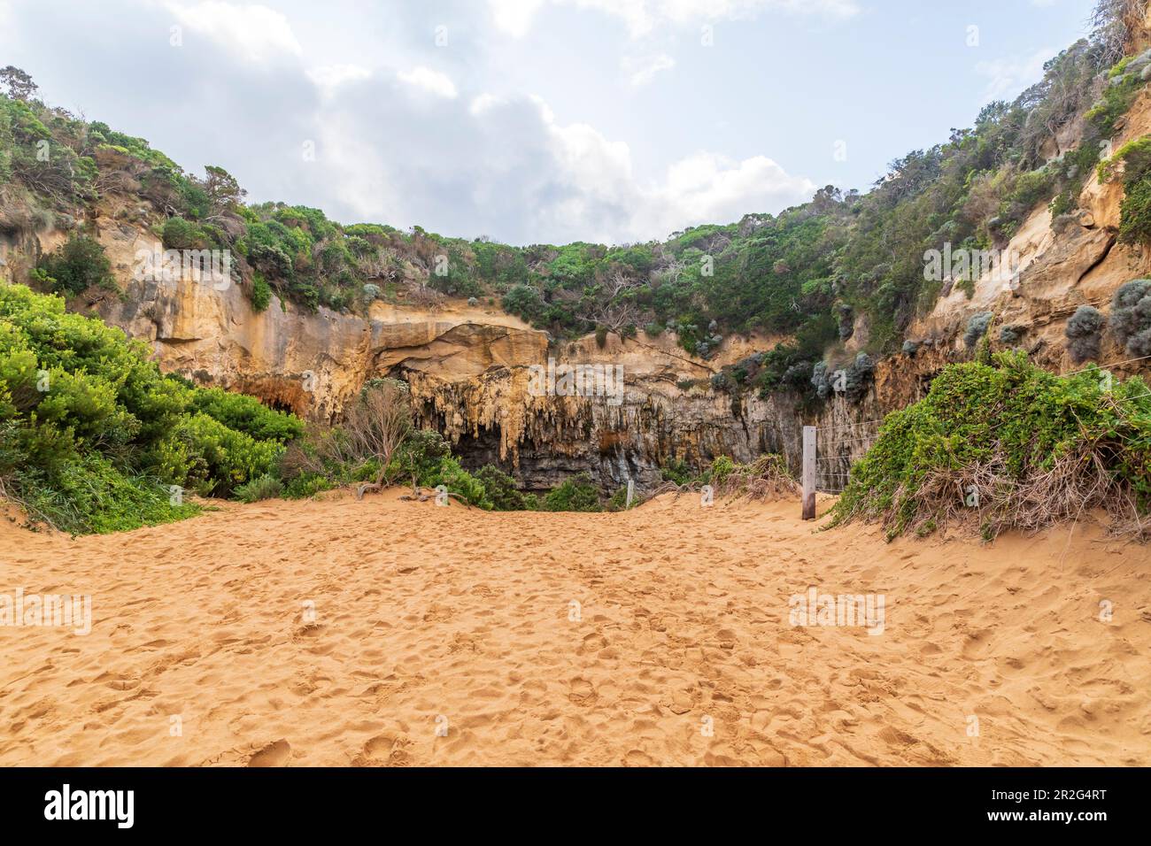 Photograph of water and wind erosion on a cliff face at Loch Ard Gorge ...