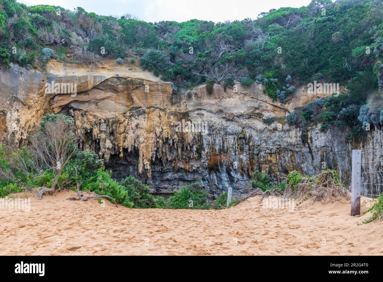 Photograph of water and wind erosion on a cliff face at Loch Ard Gorge ...