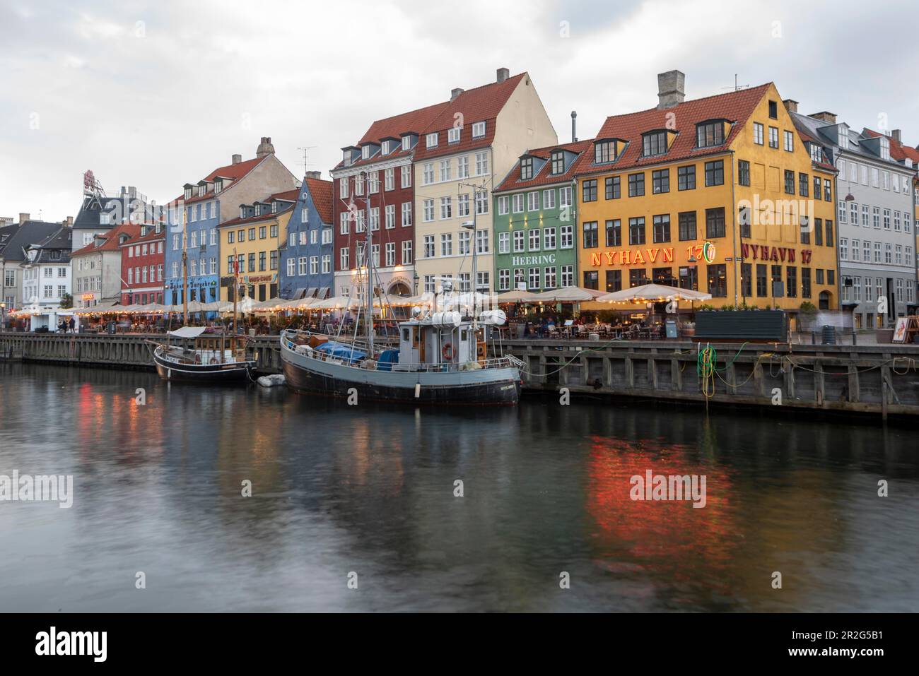 Nyhavn, harbour with colourful houses, one of the most popular sights ...