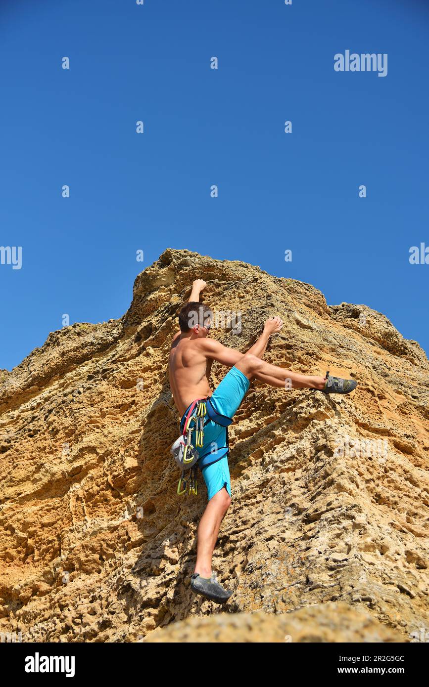 Traveler climbing up on hill hi-res stock photography and images - Alamy