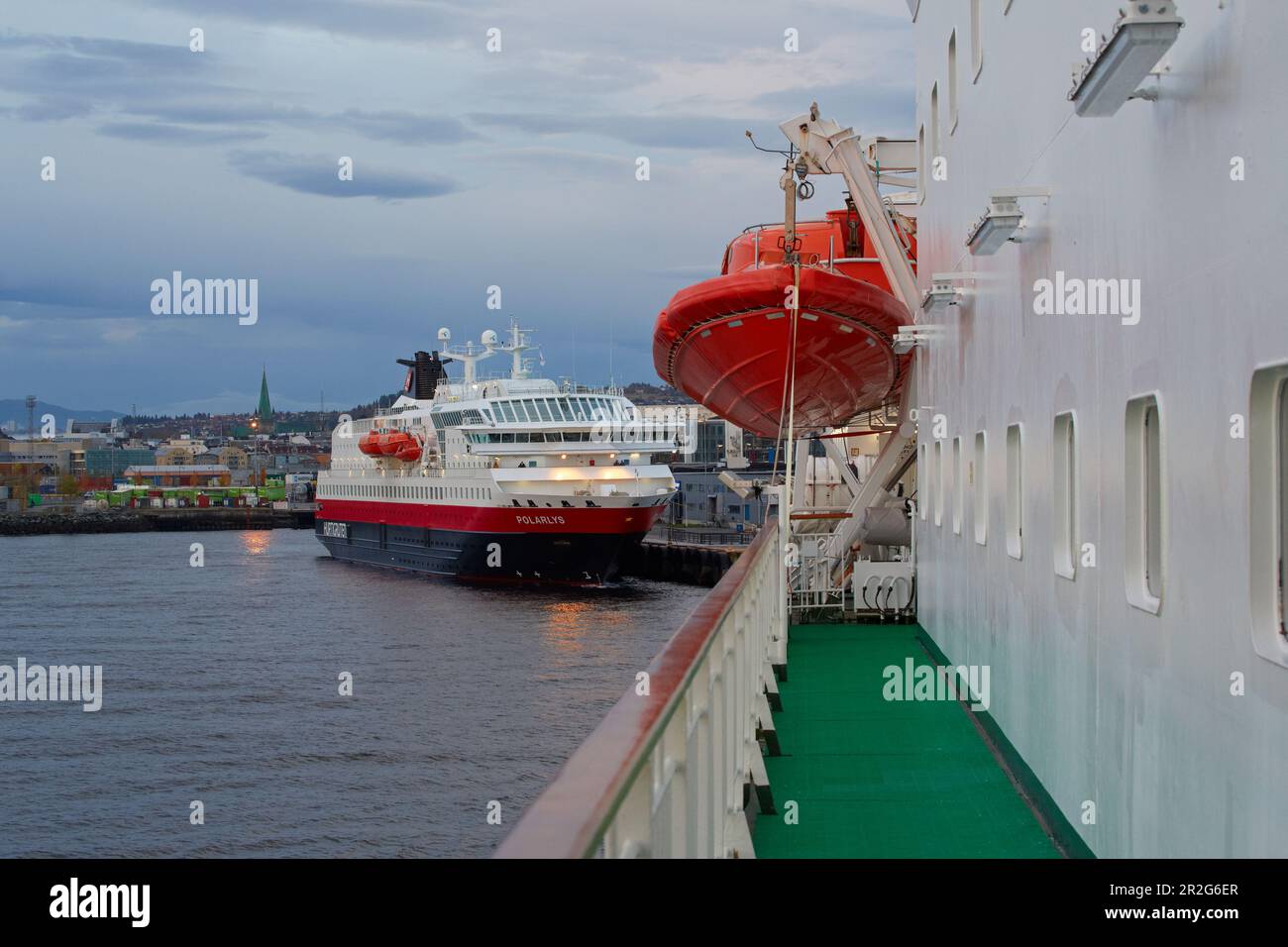 MS Polarlys of the Hurtigruten in the port of Trondheim, dawn ...