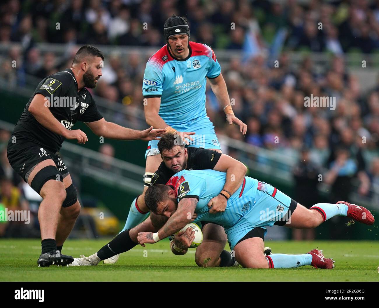 Glasgow Warriors' Jamie Bhatti tackled by RC Toulon's Teddy Baubigny ...