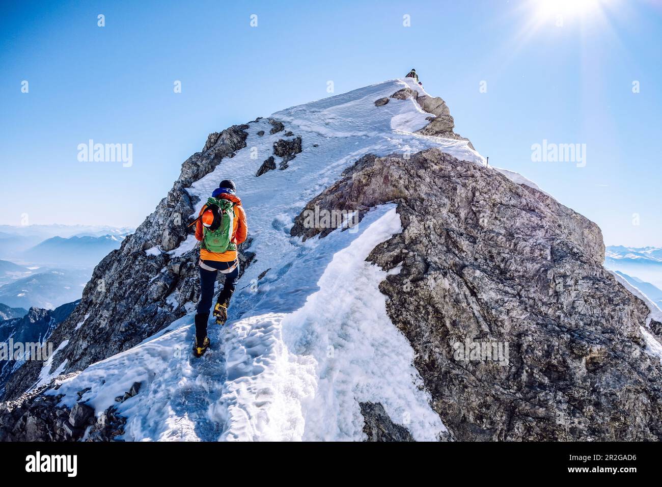 Climbers on the winter ascent of the Jubilee Ridge, from the Zugspitze ...