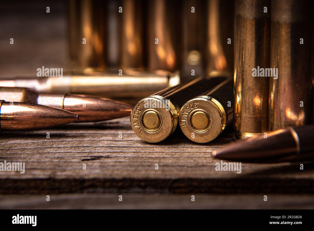 Close-up of .308 caliber rifle cartridges. Ammunition for weapons on a ...