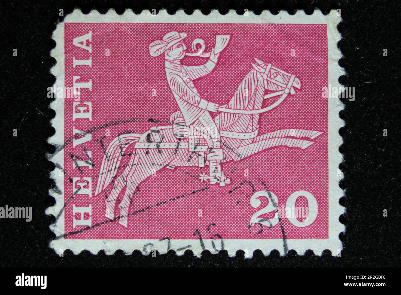 ISTANBUL, TURKEY - DECEMBER 25, 2020: Switzerland stamp shows Postilion ...