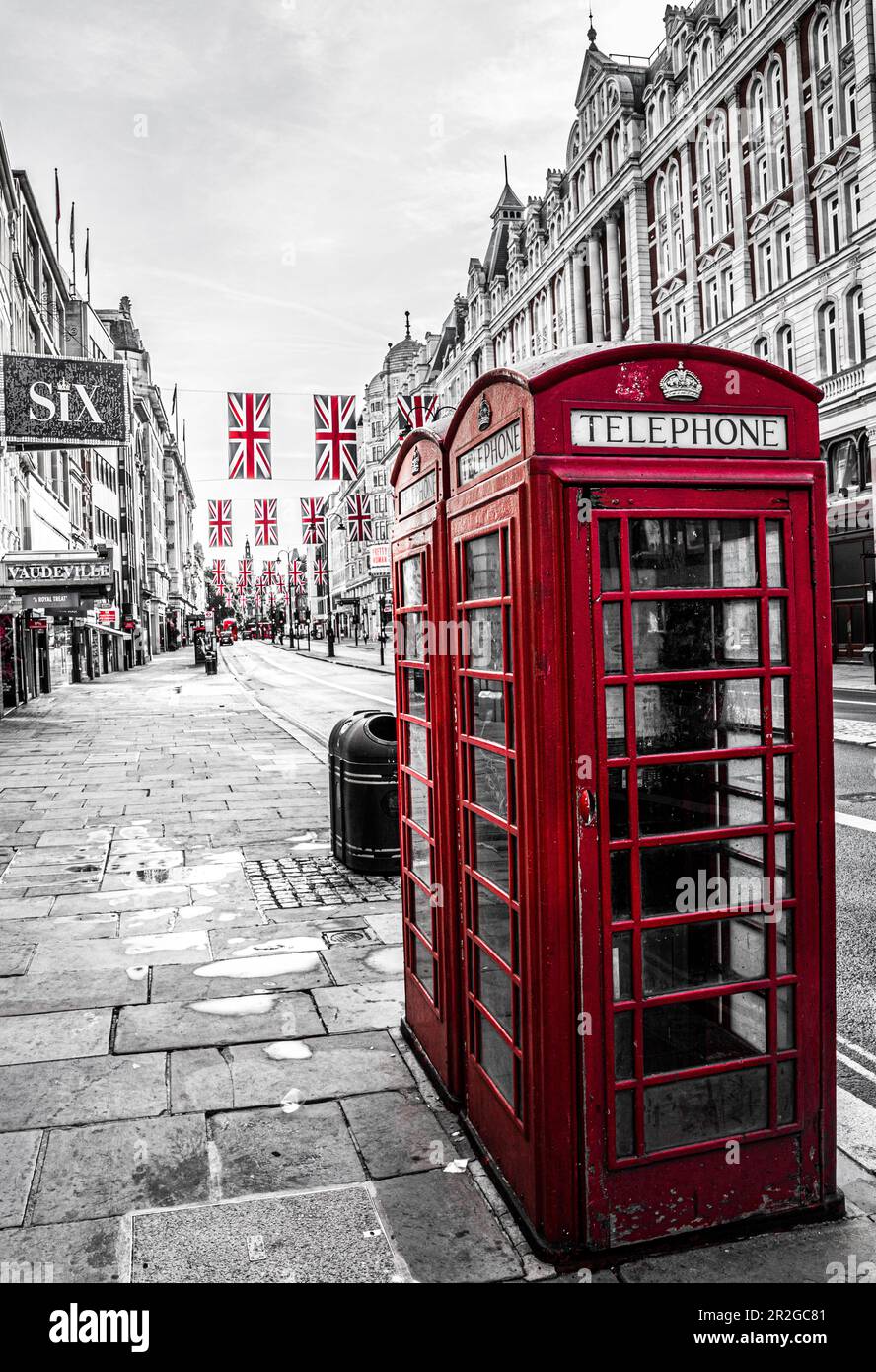 An Iconic Red Phone Booth on Strand in The City of London Stock Photo ...