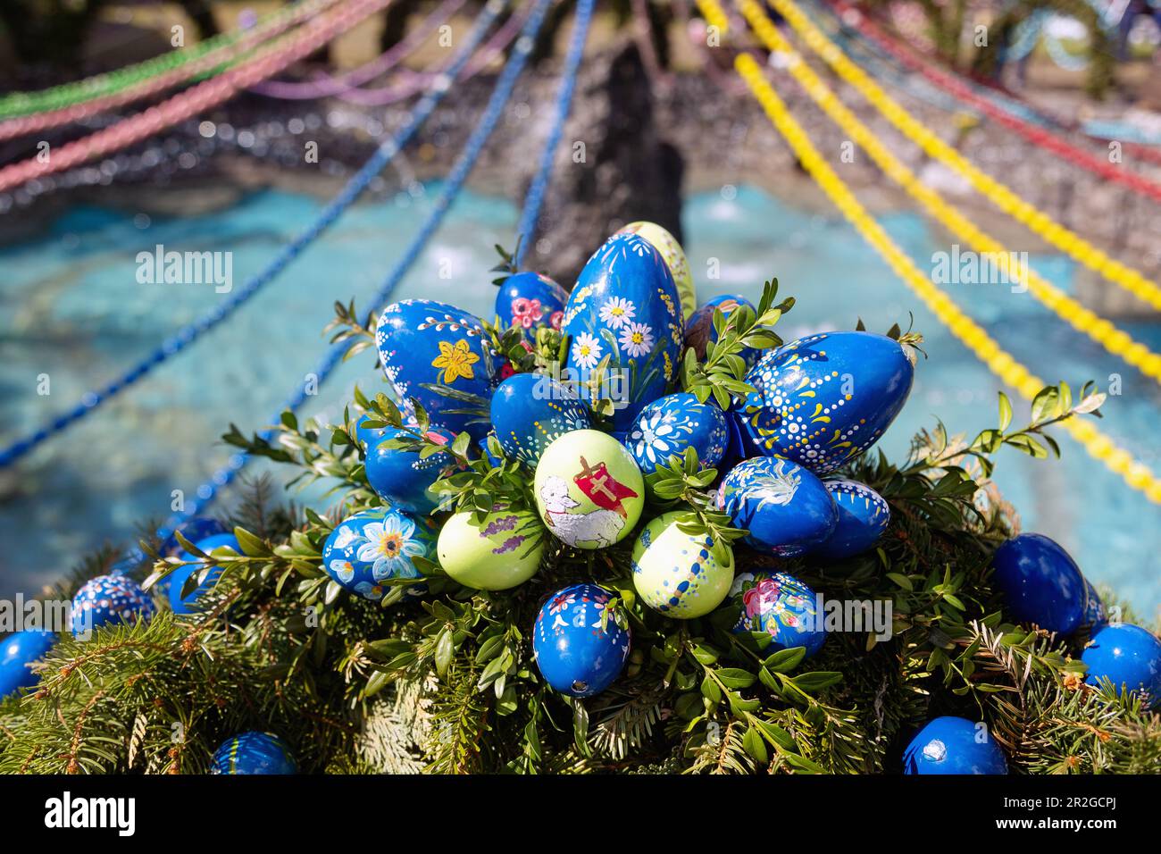 Easter fountain decorated with colorful Easter eggs in Bieberbach ...