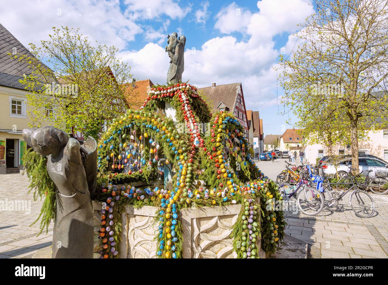 Easter fountain decorated with colorful Easter eggs in Ebermannstadt on the market square in ...