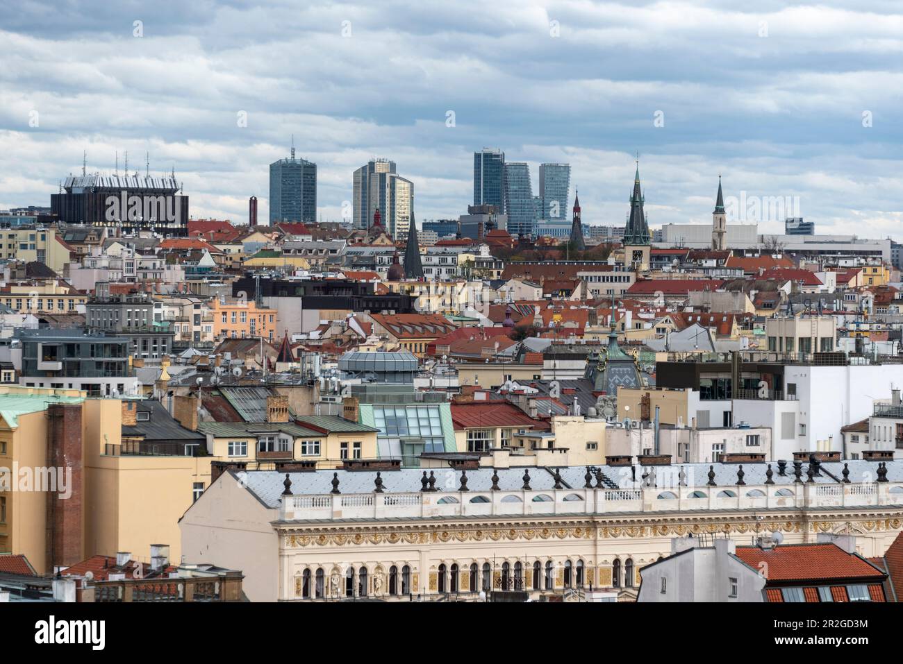 View over the rooftops of Prague, on the horizon V-Tower in the Nusle ...