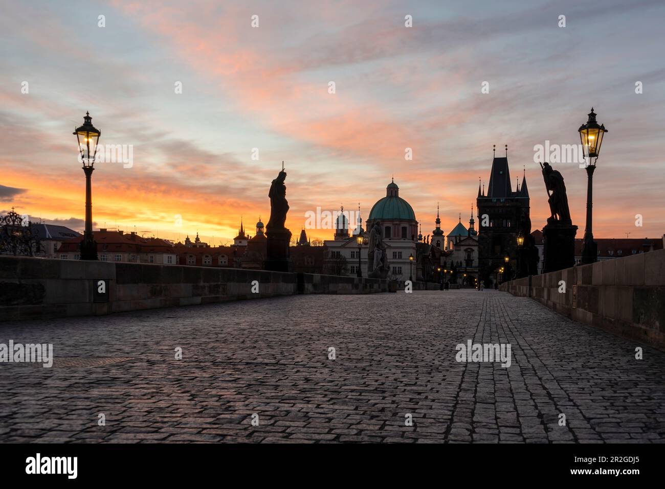 Charles Bridge, Old Town Bridge Tower, Church of the Cross, dawn, Prague, Czech Republic Stock ...