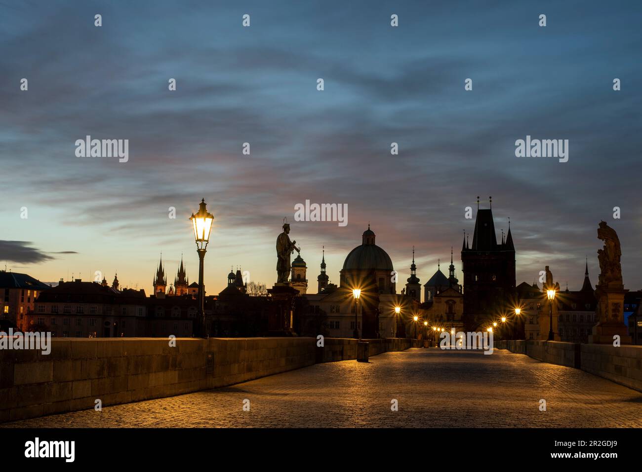 Charles Bridge, Old Town Bridge Tower, Church of the Cross, dawn, Prague, Czech Republic Stock ...