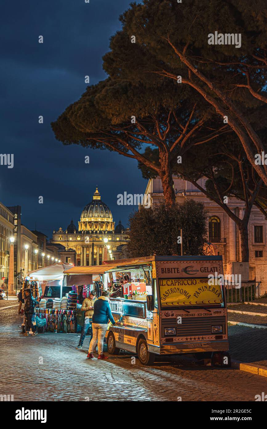 Market stalls in Piazza Pia with St. Peter's Basilica in the background ...
