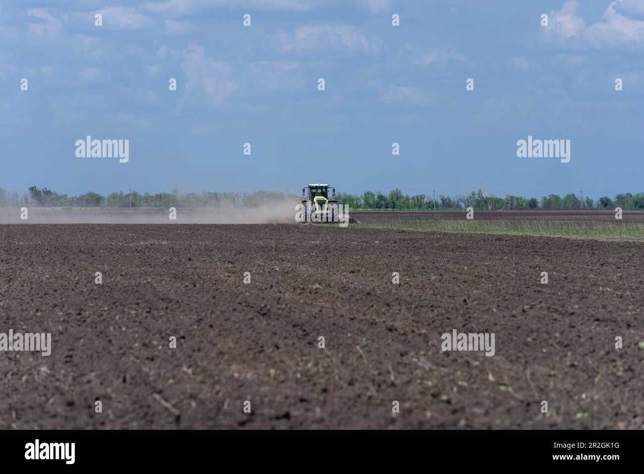 Recently de-mined field is plowed for planting at farm Pershe Travnia ...