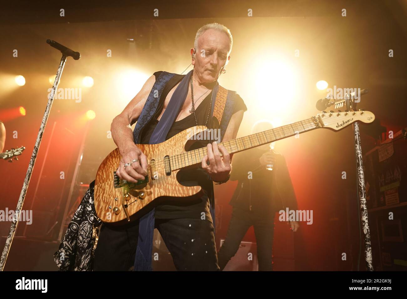 Def Leppard performing on stage during their "One Night Only" gig at ...