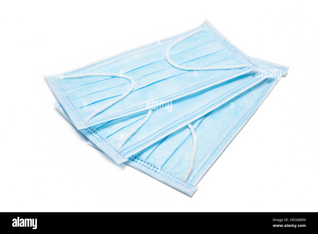 Medical protective masks in blue color isolated on white background ...