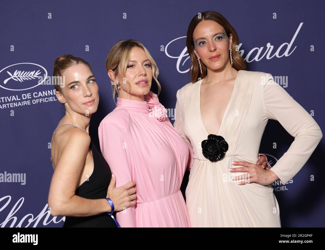 Nancy Grant, from left, Magalie Lepine Blondeau, and Monia Chokri pose for photographers upon ...