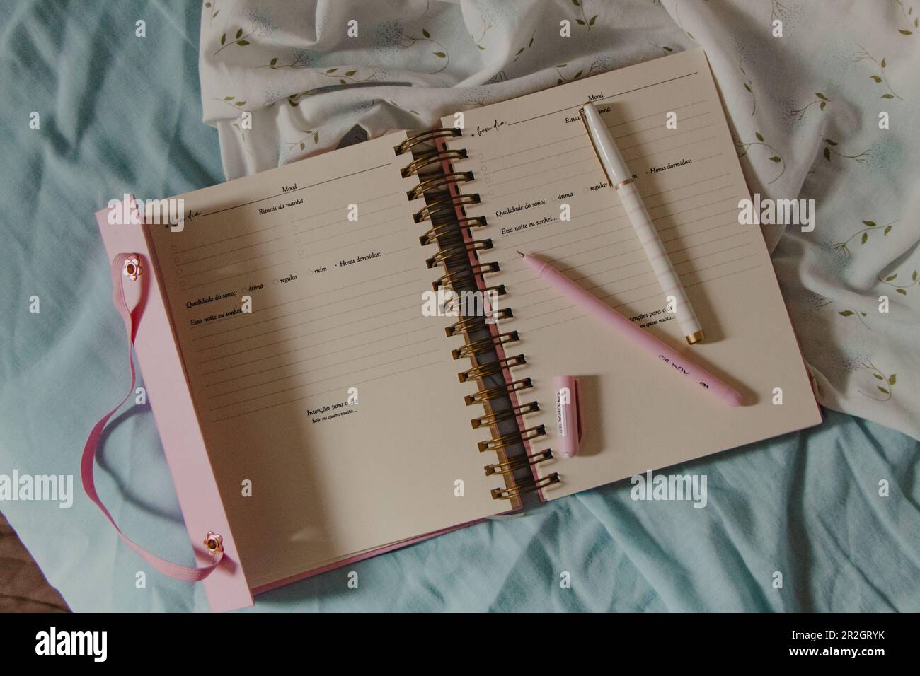 stationery items on the bed Stock Photo - Alamy