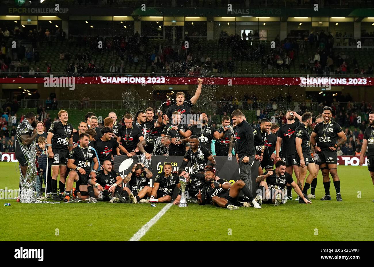 RC Toulon players celebrate with the trophy following the ECPR ...