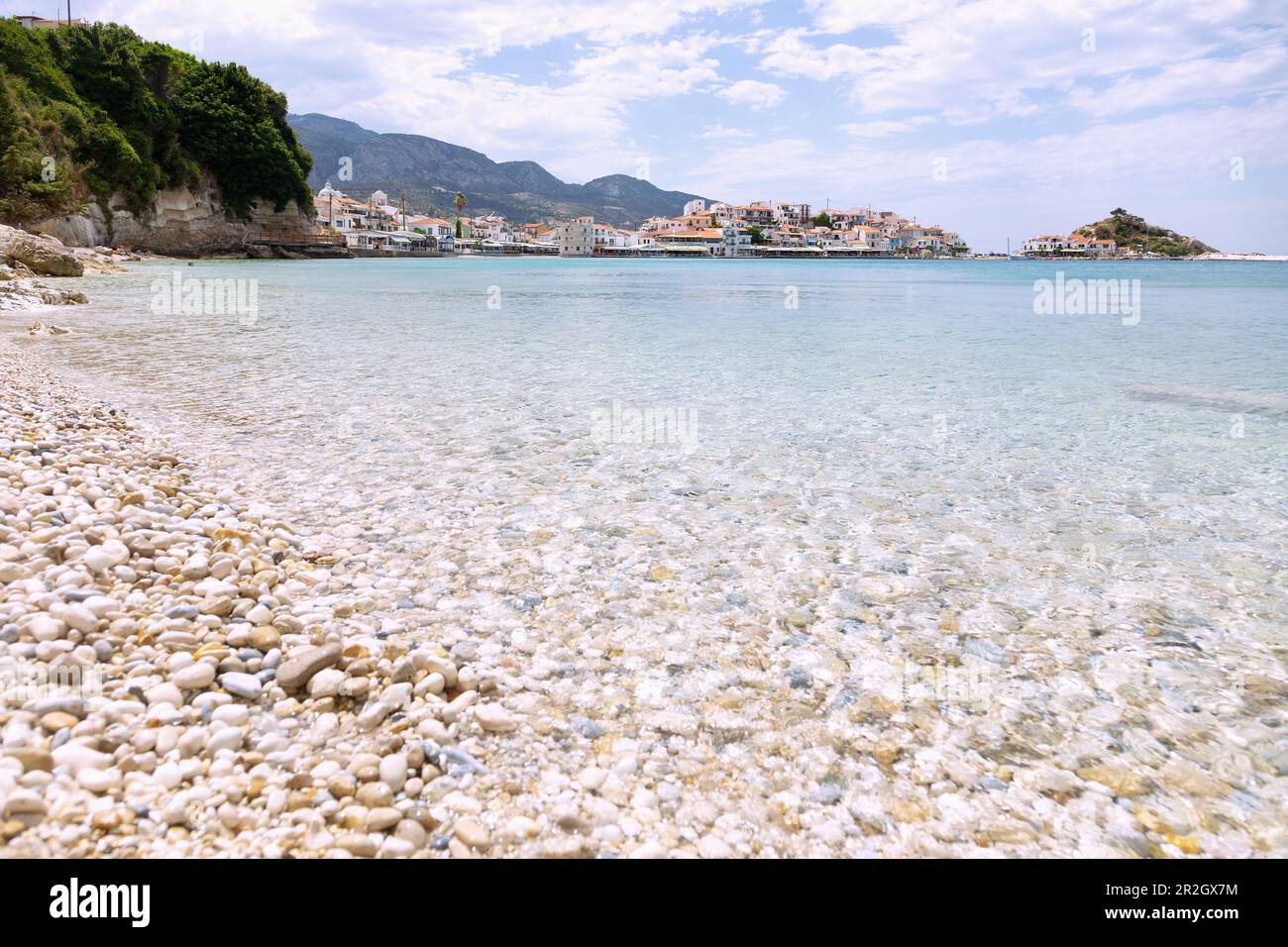 Kokkari, old town with harbor and pebble beach on the island of Samos ...