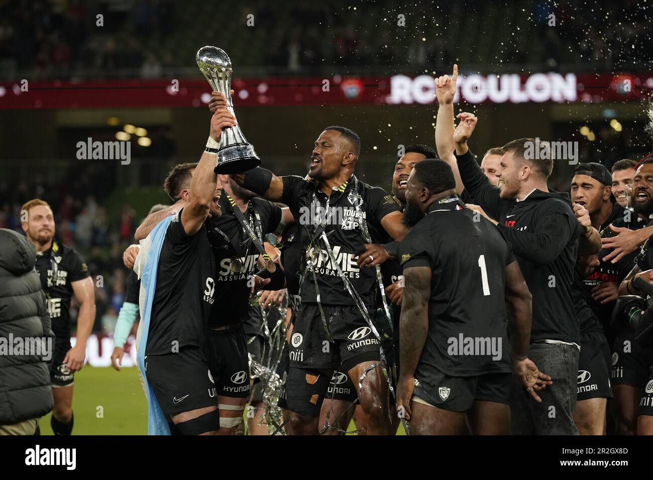 RC Toulon players celebrate with the trophy following the ECPR ...