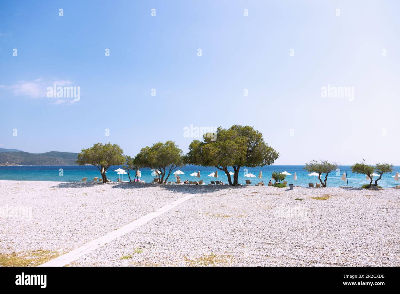Pebbly Mikali Beach at Psili Ammos in the southeast of the island of ...