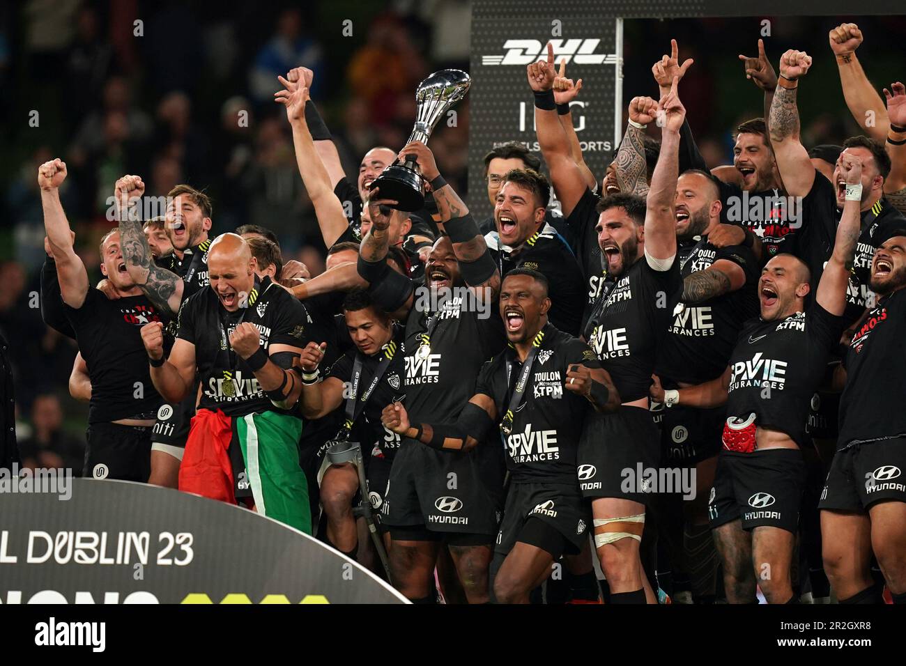 RC Toulon players celebrate with the trophy following the ECPR ...