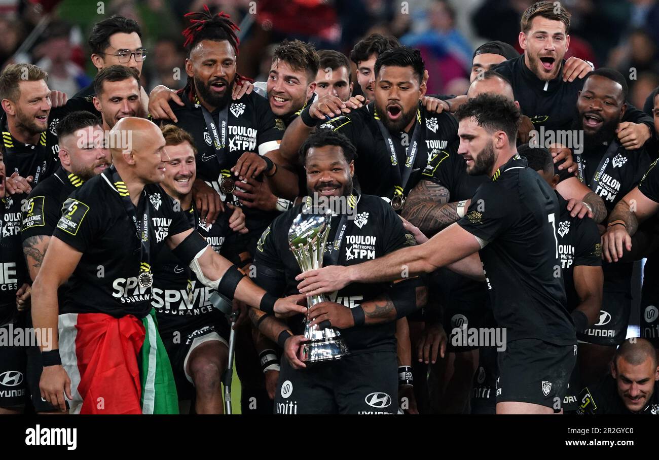 Toulon's Mathieu Bastareaud lifts the trophy with team-mates as they ...