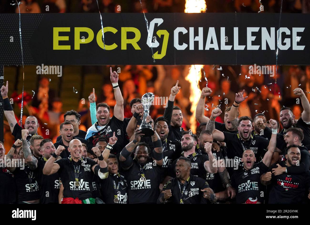 Toulon's Mathieu Bastareaud lifts the trophy with team-mates as they ...