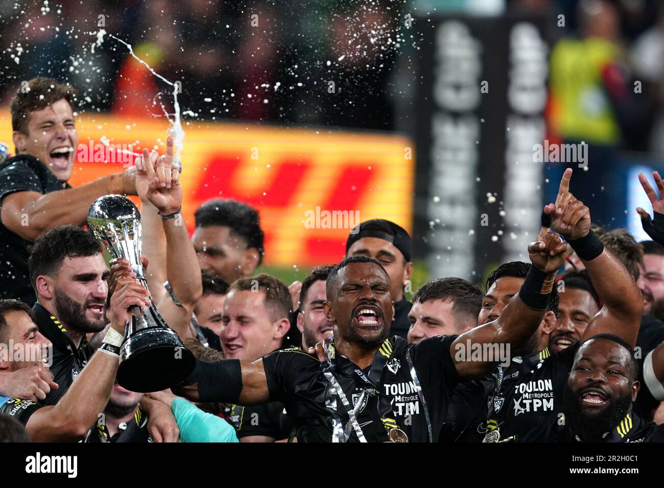 Toulon's Jiuta Wainiqolo holds the trophy with team-mates as they ...