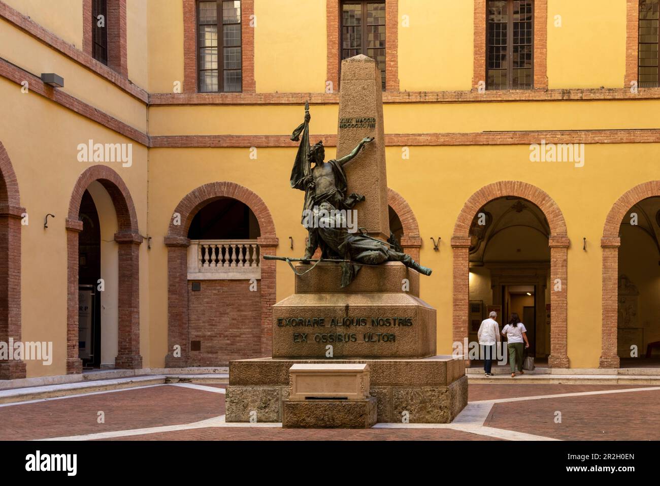 Statue in the courtyard of the University of Siena, historic old town ...