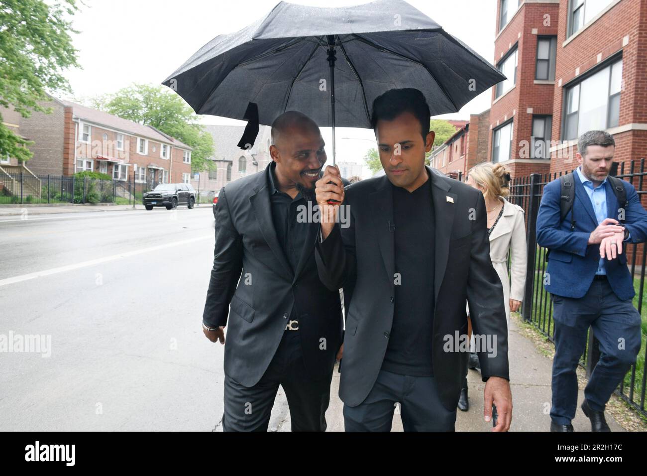 Republican Presidential candidate Vivek Ramaswamy right, speaks with ...