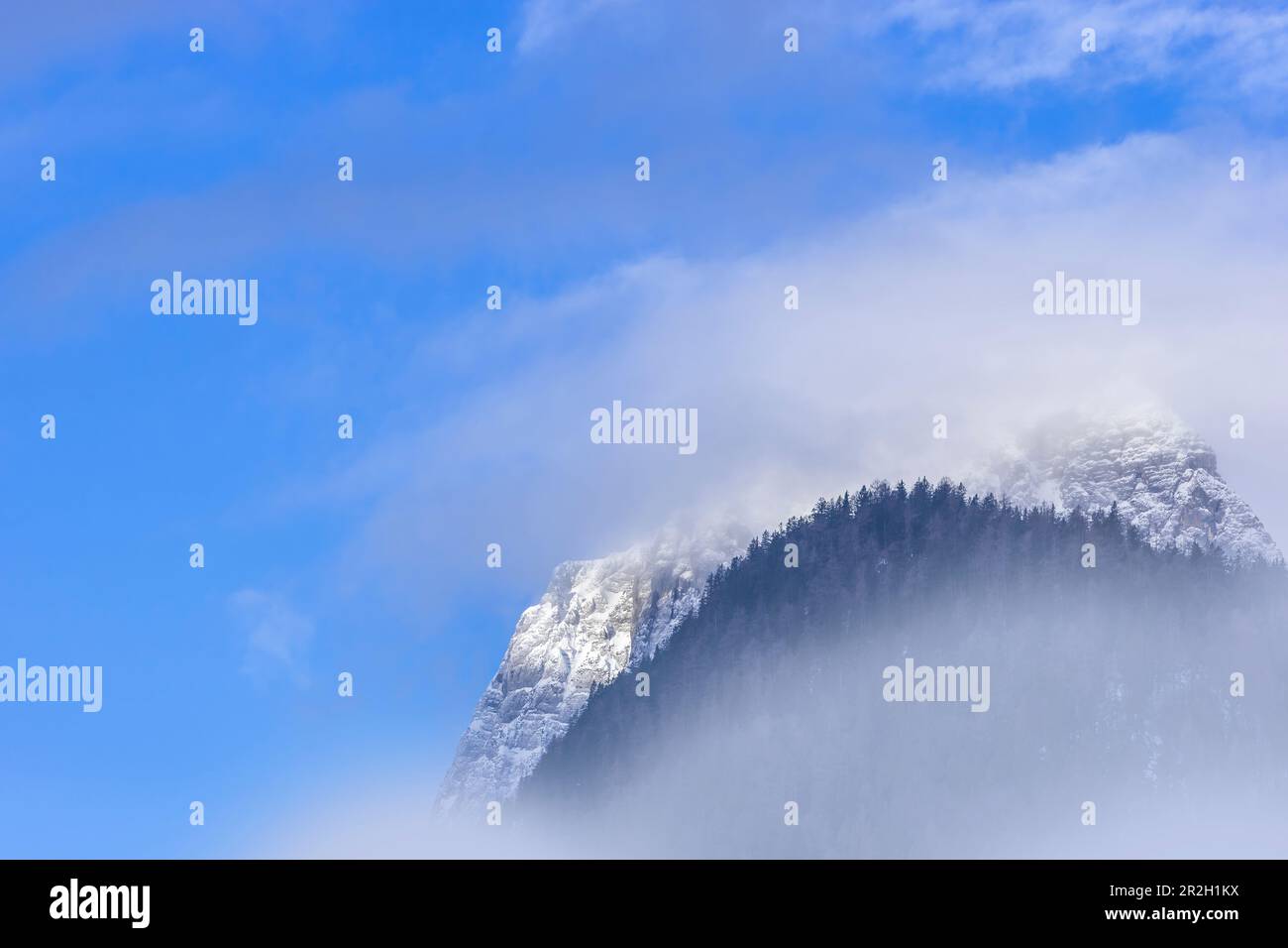 The impressive mountains at Hintersee on a fantastic foggy morning ...