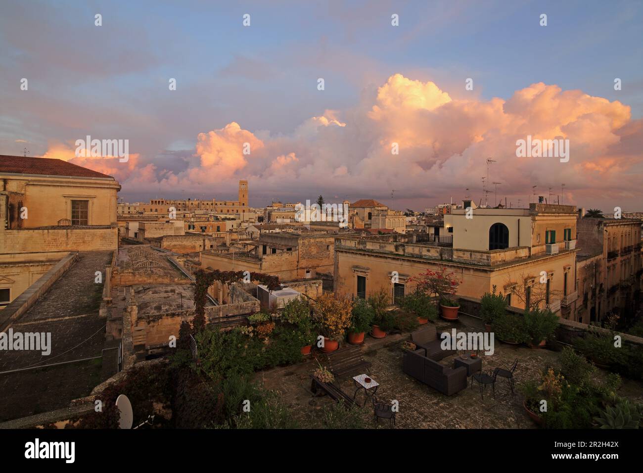 Roof terrace of the Palazzo Rollo and he view over the roofs of the old ...