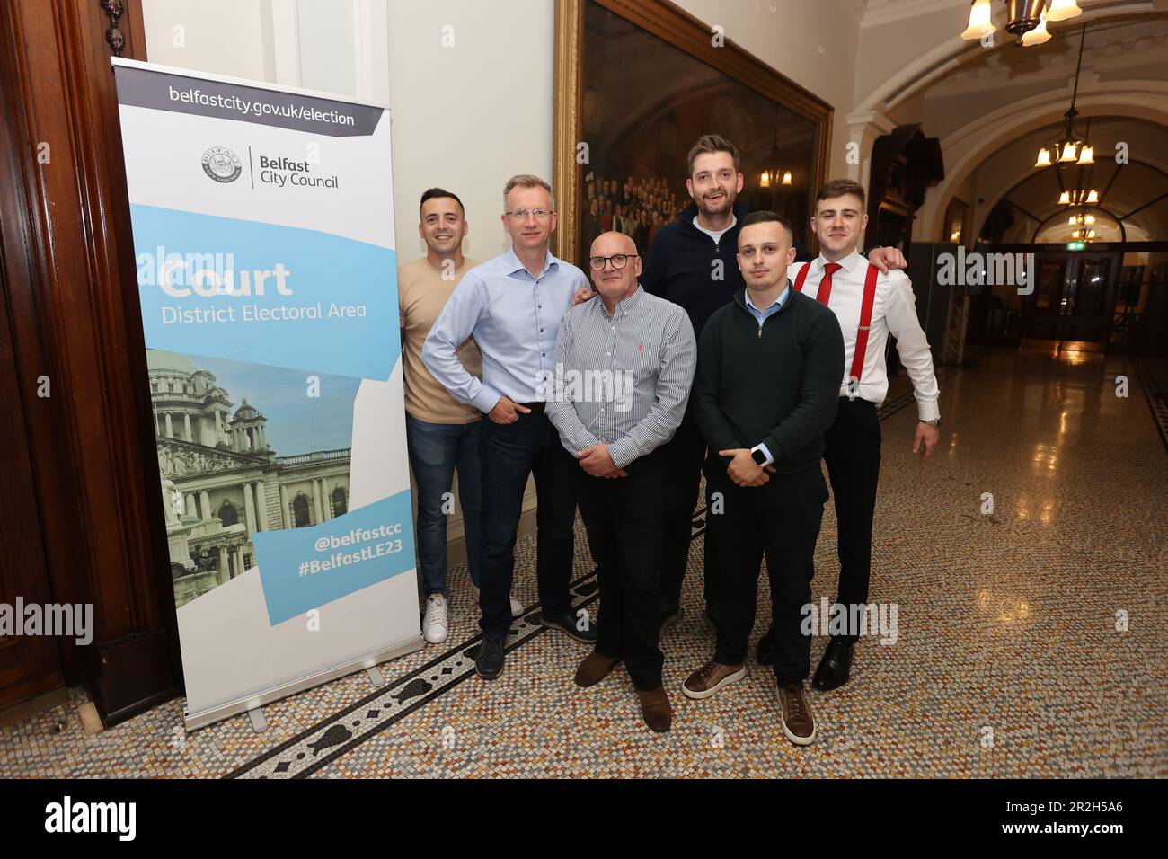 DUP candidate Ian McLaughlin (centre), who has won a seat, at Belfast ...