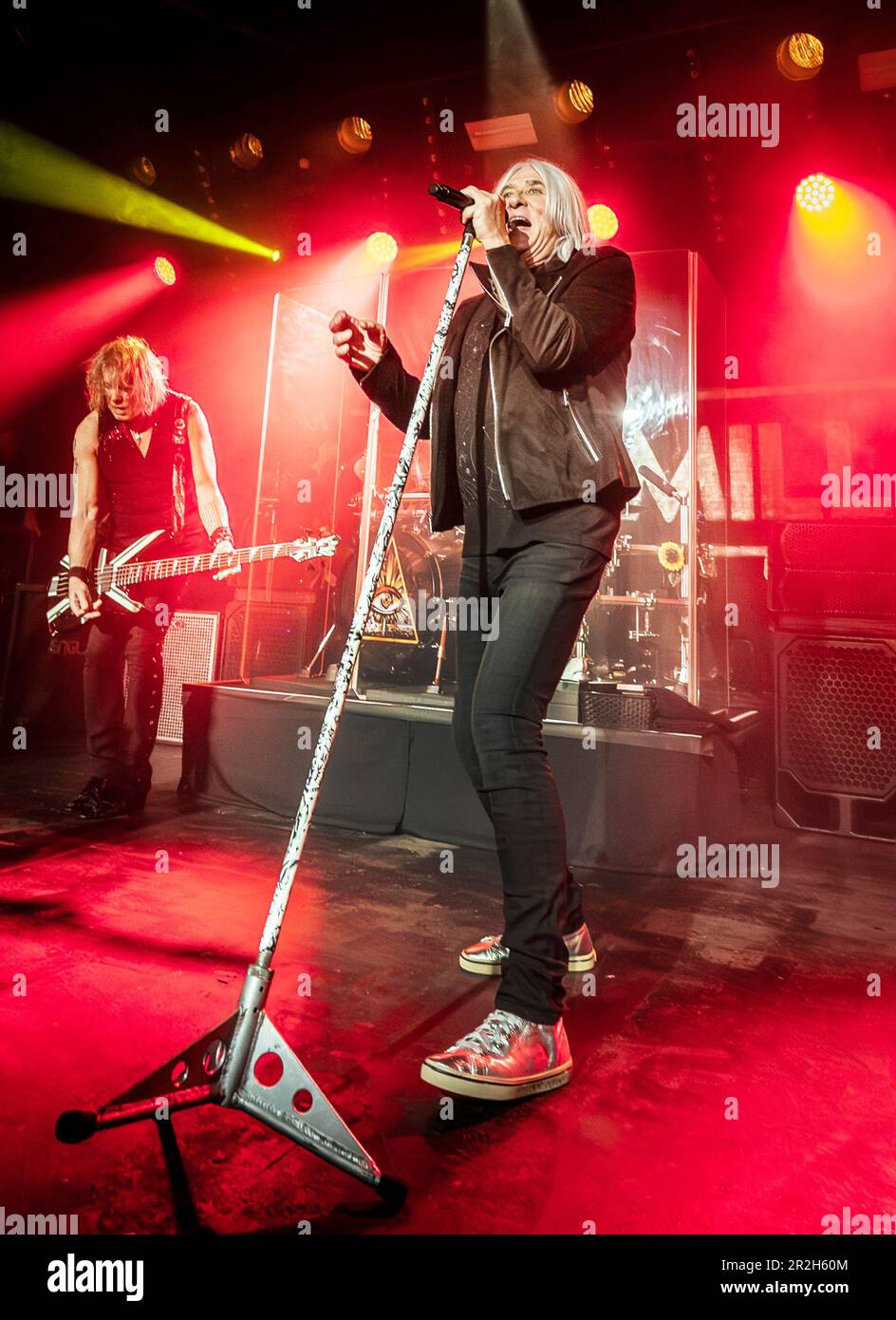 Lead singer Joe Elliott performs with Def Leppard on stage during their ...