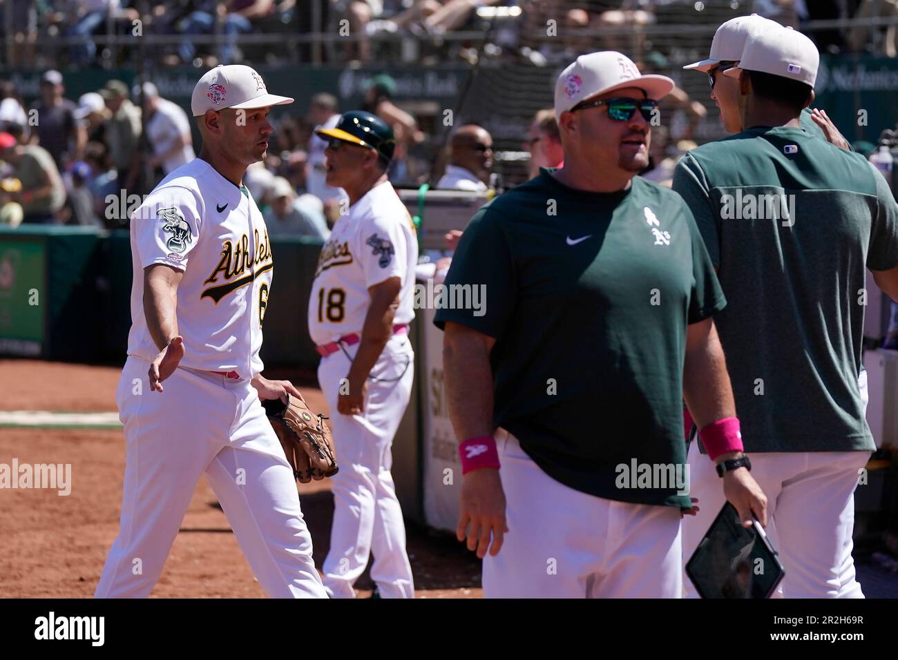 Oakland Athletics pitcher Garrett Acton, left, during a baseball game ...