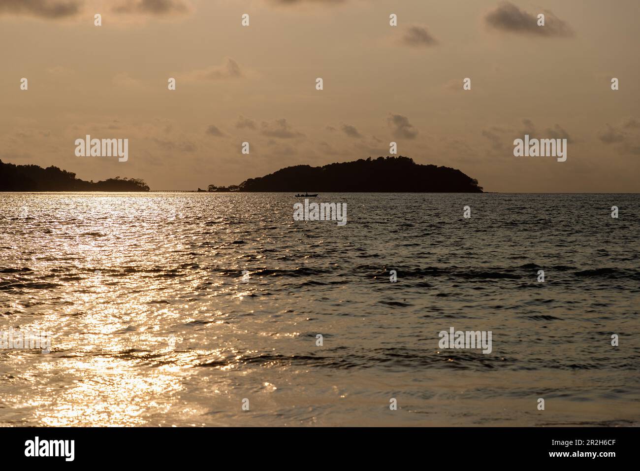 Bom Bom Island and fishing boat after sunset, view from Praia Cajú on ...