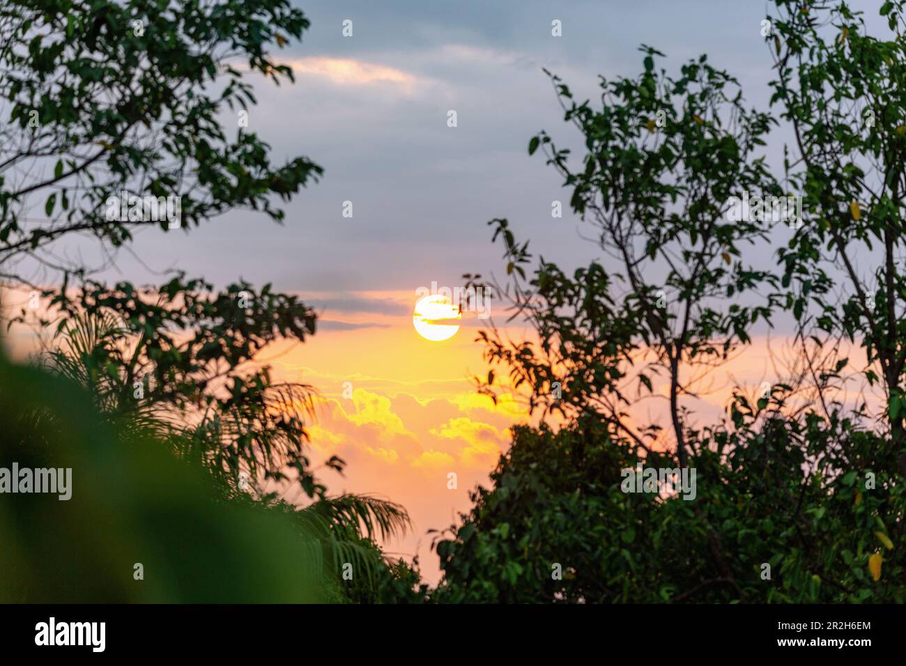 dramatic evening sky with sunset behind clouds on Príncipe Island in West Africa Stock Photo - Alamy