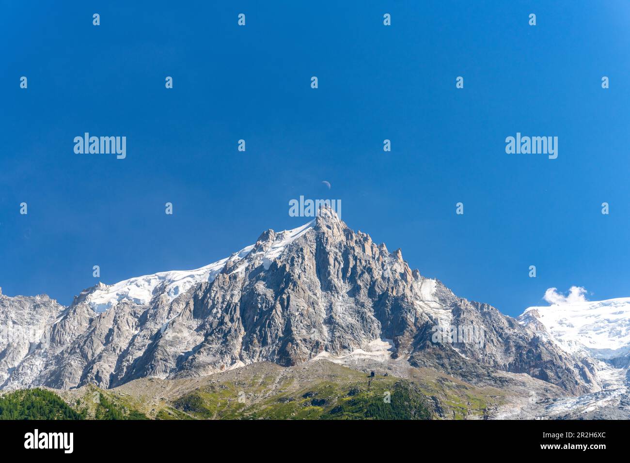 View from Chamonix Mont Blanc to the Aiguille du Midi with a full moon ...