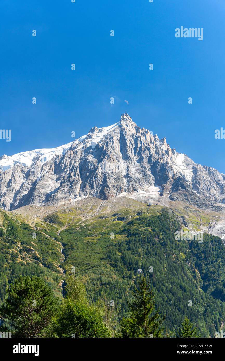 View from Chamonix Mont Blanc to the Aiguille du Midi with a full moon ...